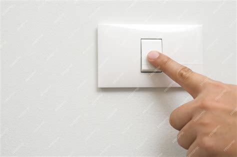 Premium Photo Turn Off The Light Close Up Finger Man Hand Is Closing