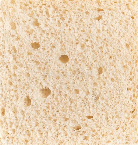 Close Up Texture Of White Bread Showing Detailed Porous Structure