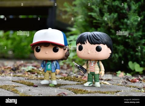 Funko Pop Action Figures Of Dustin With Compass And Mike With Walkie