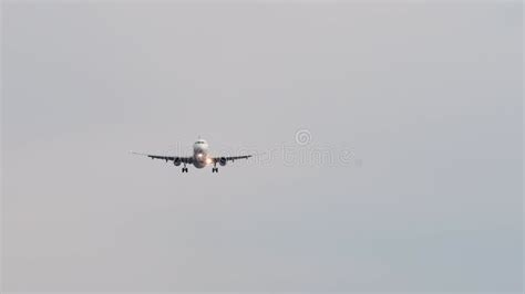 Front View Of The Aircraft Airbus A320 Approaching The Runway Stock