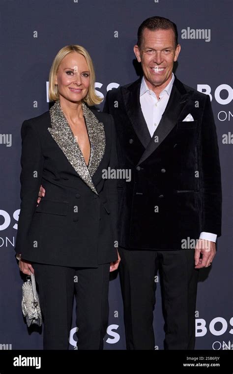 Louise Camuto Grieder Left And Daniel Grieder Pose For Photographers