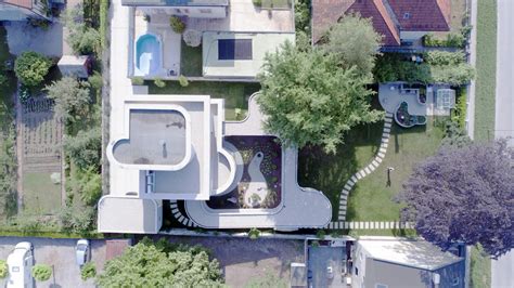 Ofis Arhitekti Adds Looping Extension To Ring House In Slovenia