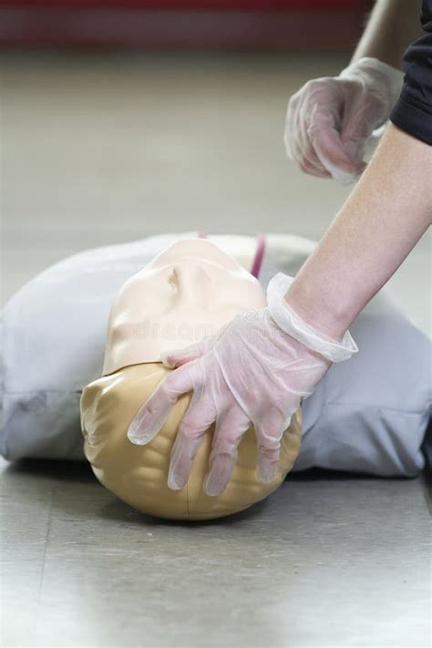First Response Worker Demonstrates Cpr And Proper Defibrillator
