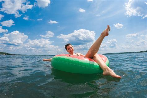 Happy Woman Chilling On Inflatable Pool Floats Stock Image Image Of Face Clouds 298796809
