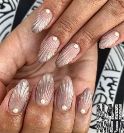 Under The Sea 30 Seashell Nail Art Ideas Seashell Accent Nail With