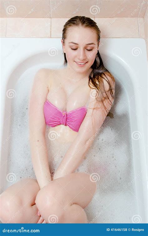 Picture Of Beautiful Blond Young Woman Happy Smiling Relaxing Lying In