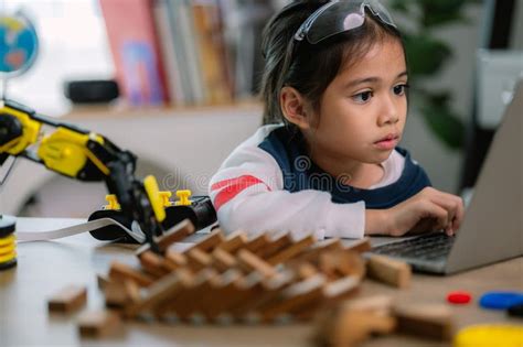Asian Girls Were Learning Robot Programming And Getting Lessons Control
