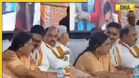 watch bjp mp satish gautam touches woman mla on stage video stirs