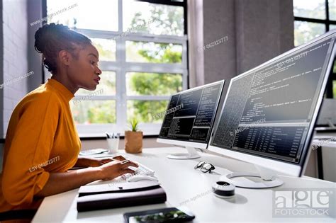 African American Woman Programmer Girl Coding On Computer Stock Photo