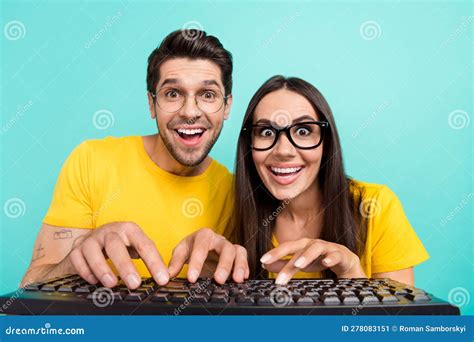 Photo Of Overjoyed Funny Excited Nerd Geeks Writing Keyboard Looking