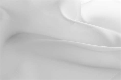텍스처 배경 패턴입니다 실크 직물은 투명 하 고 색깔에서 백색 이다 추상 부드러운 쉬폰 질감 배경입니다 커브와 웨이브 부드러운