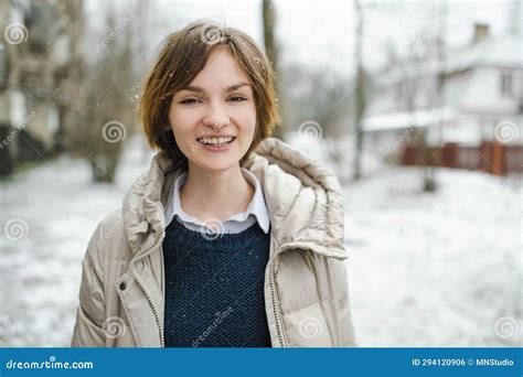 Cute Teen Girl Having Fun On A Walk In City Park On Chilly Winter Day