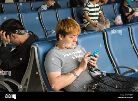Chinese Passenger Waiting For Train In Chongqing Rail Station China