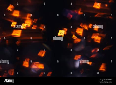 Dj Mixer In A Nightclub With Glowing Colored Lights From Controllers And Buttons In The