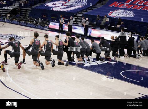 Santa Clara Players Coaches And Staff Kneel During The National Anthem