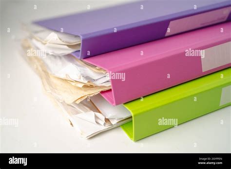 File Folder Binder Stack Of Multi Color On Table In Office Stock Photo Alamy