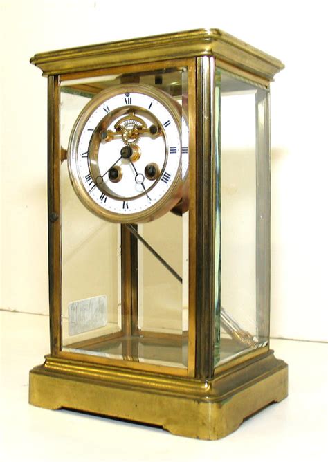 Bonhams A French Brass And Four Glass Mantel Clock