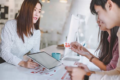 Creative Ux Ui Designers Designing Screens For Mobile Responsive