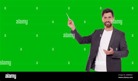 Chroma key compositing. Broadcaster against green screen, banner design Stock Photo - Alamy