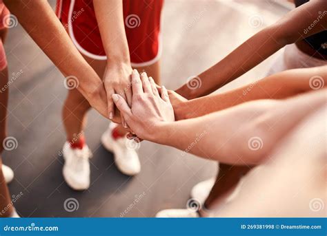 Lets Go Team An Unrecognizable Group Of Sportswomen Piling Their Hands