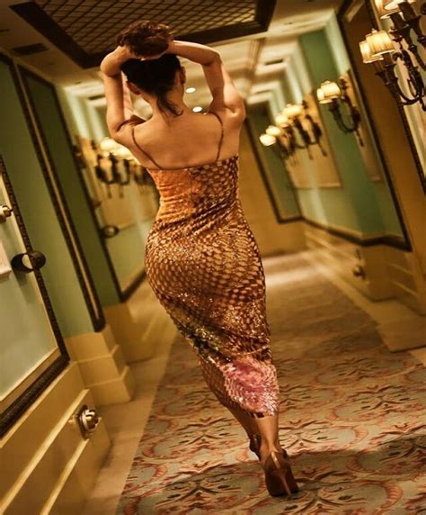 Mouni Roy Is Looking Very Glamorous And Bold In Deep Neck Bodycon Dress