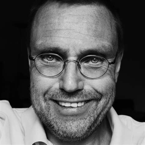 Premium Photo Portrait Of Man Wearing Eyeglasses Over Black Background