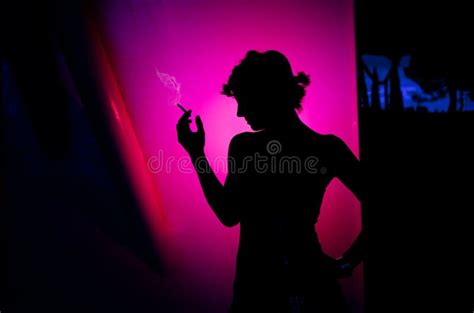 Smoking Beautiful Woman Silhouette On Pink Background Lifestyle Stock