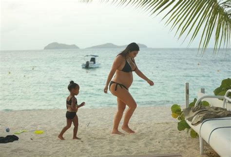 Kim Kardashian Plays With North On The Beach In St Barts While Showing