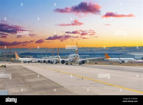 Morning View Of A Queue Of Planes Ready For Takeoff Taxiing On The
