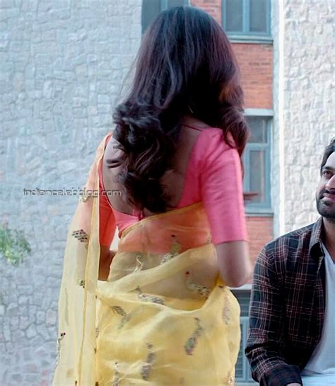 Ritu Varma Varudu Kaavalenu Hot Backless Lehenga Choli Photos Caps