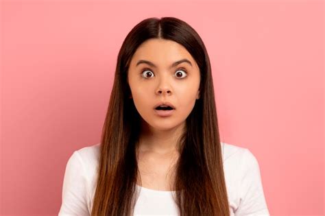 Premium Photo Omg Closeup Portrait Of Shocked Teen Girl Looking At Camera