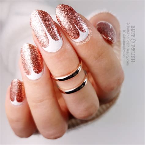 Rose Gold Glitter Gel With Freehand Stilettos In White Buff And Polish