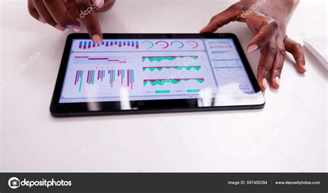 African American Data Analyst Using Data Analytics Kpi Dashboard Stock