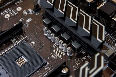 Premium Photo | Computer motherboard on dark background, close up