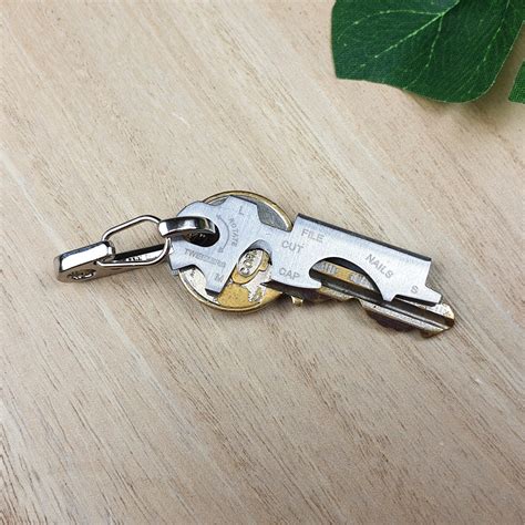 8 In 1 Multitool Key Ring Ditverzinjeniet Nl