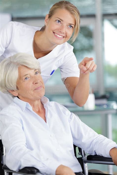 Senior Lady Woman Patient In Wheelchair At Nursing Hospital Stock Image