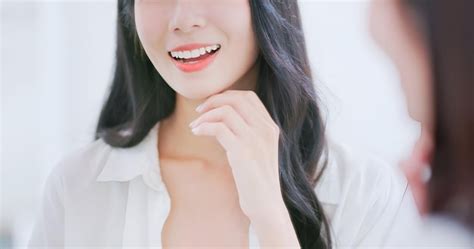Premium Photo Asian Beauty Satisfies Her Teeth