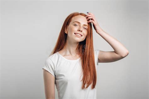 Beautiful Redhead Girl With Freckles Smiling Looking At Camera Stock