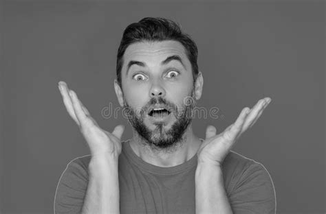 Emotional Scared Man Looks With Frightened Expression Nervously