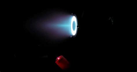 A Laboratory Hall Effect Thruster Ion Thruster Firing In A Vacuum