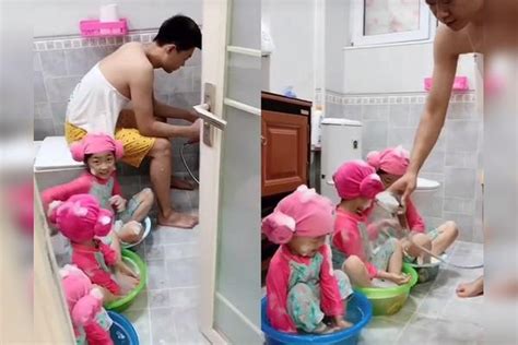 奶爸给三女儿洗澡结果不脱衣服还不忘游戏 网友：看似洗澡实则浇菜