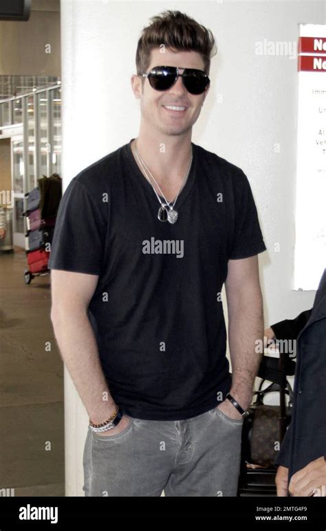 EXCLUSIVE Singer Robin Thicke Arrives At LAX After Returning From