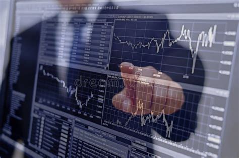 Analyzing Income Charts And Graphs With Calculator Close Up Business Financial Analysis And