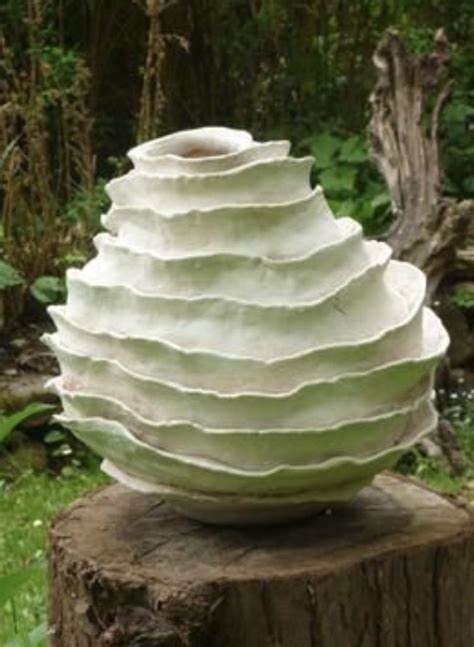 White Vase On Tree Stump