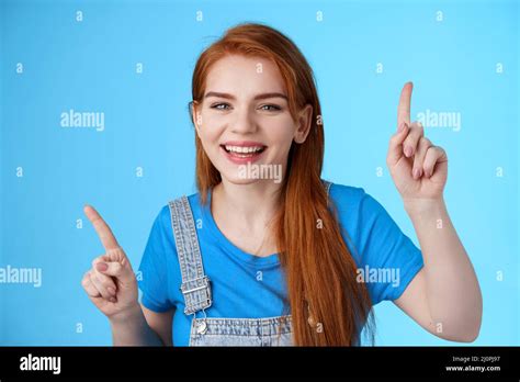 Close Up Cheerful Carefree Redhead Dancing Girl Pointing Up Raising Fingers Smiling Amused