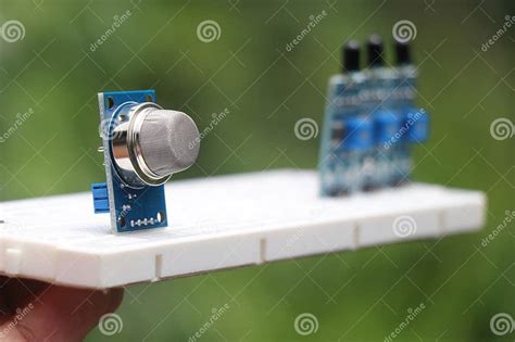 Gas Sensor On A Breadboard That Is Used To Detect The Leakage Of Lpg