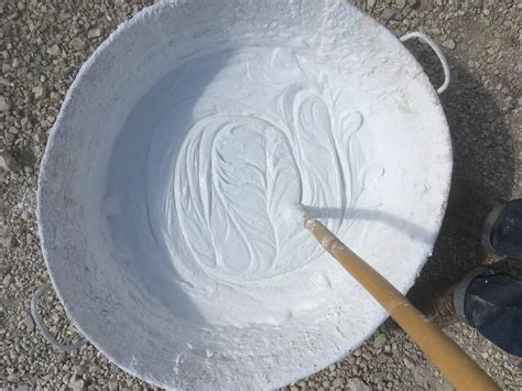 lime slaking lime putty after the addition of water to nuggets of