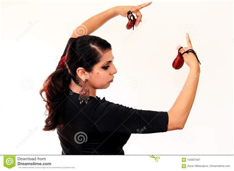 Jeune Flamenco Gitan Espagnol De Danse De Femme Avec Les Castagnettes