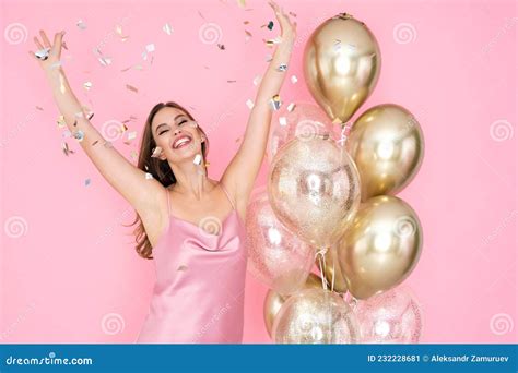 Happy Young Woman Celebrates New Year Or Happy Birthday Party With Air