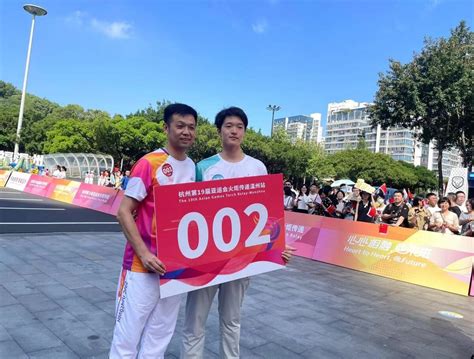 薪火相传丨千年商港迎来亚运火炬 奥运冠军朱启南担任首棒火炬手 荆楚网 湖北日报网